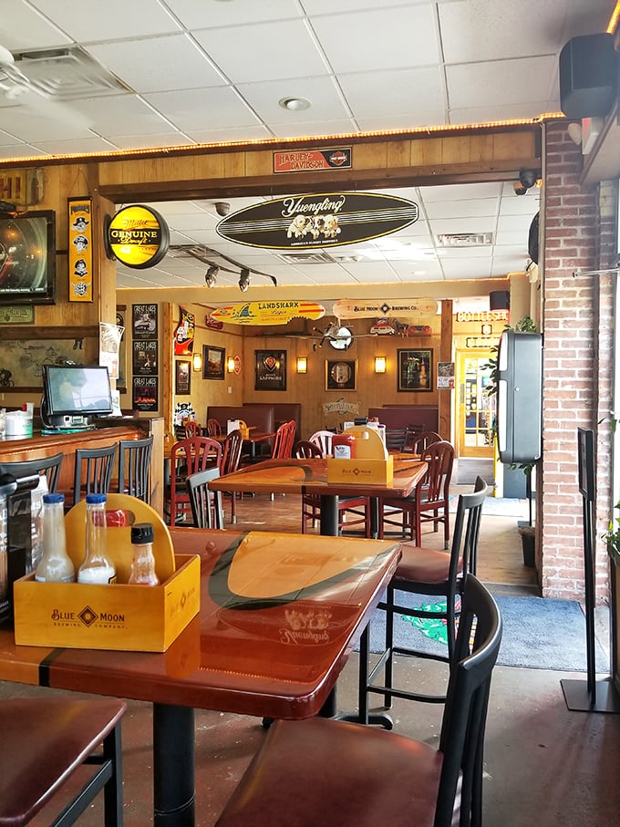 Step inside and you're greeted by that perfect blend of nostalgia and comfort – wood paneling, vintage signs, and tables that whisper, "Your conversation belongs here."