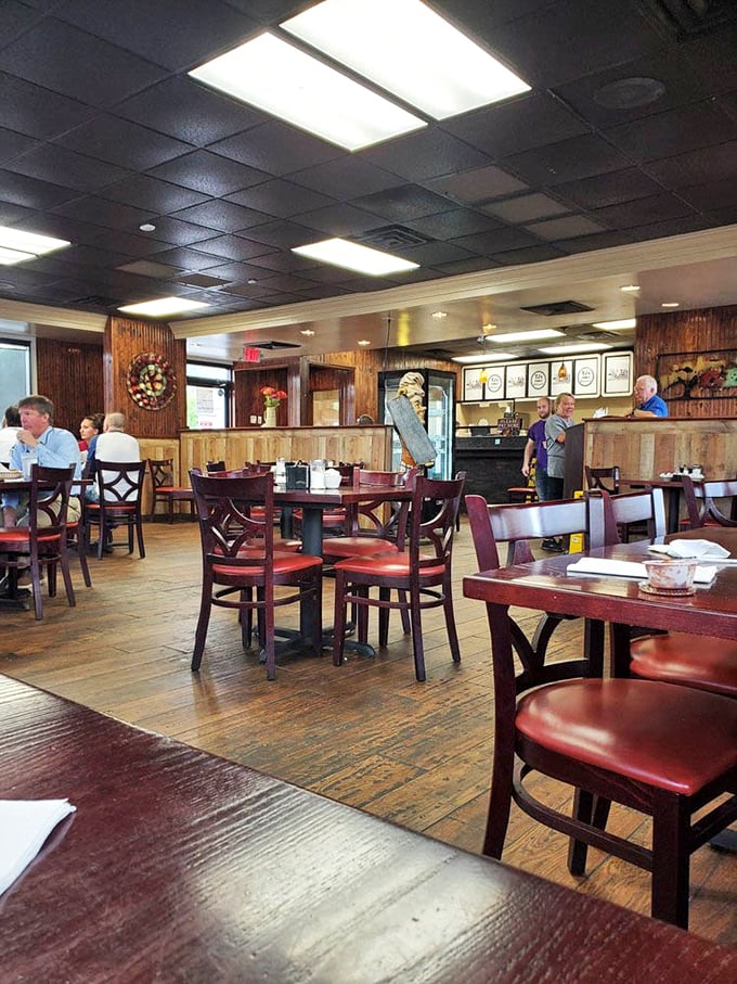 Step inside and the warm wood paneling instantly wraps around you like a comfortable hug from an old friend.