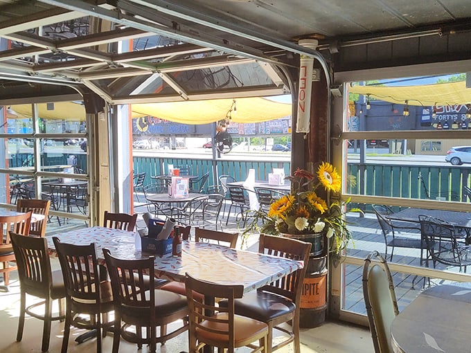The indoor-outdoor flow is genius, with garage doors that open to connect diners with the patio. Fresh flowers add that special touch of Southern hospitality.