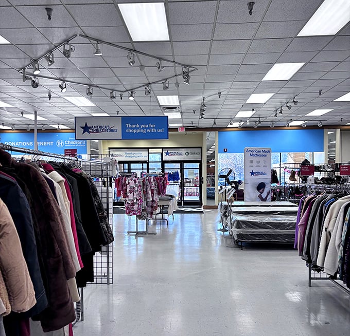 Bright lights, big savings. The clean, organized interior feels more like a department store than what most expect from a thrift shop.