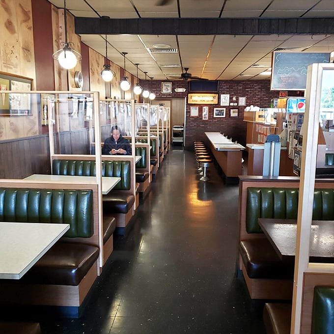 Step inside and time stands still – these classic green vinyl booths have witnessed decades of Cincinnati conversations and countless cheese coney conquests.