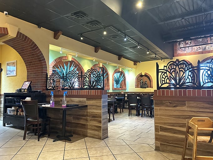 Inside, decorative brick archways and ornate ironwork create intimate dining spaces that transport you straight to Mexico without the passport.