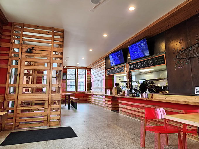 Wood slats and red accents create the perfect backdrop for barbecue contemplation. Like a Carnegie Hall for carnivores, but with better napkins.