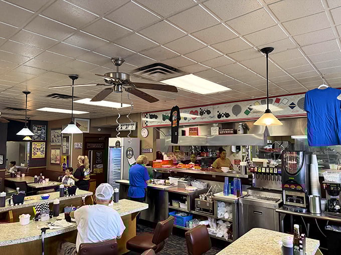 Inside Charlie Browns, the open kitchen isn't just functional—it's dinner theater where pancake flipping becomes an art form worth the price of admission.