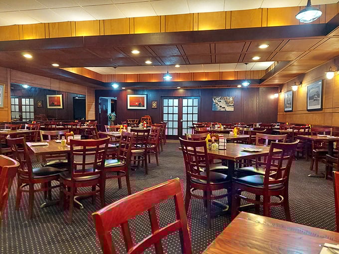 Warm wood paneling and comfortable seating create that perfect "welcome home" feeling—like Grandma's dining room, if Grandma were a seafood savant.