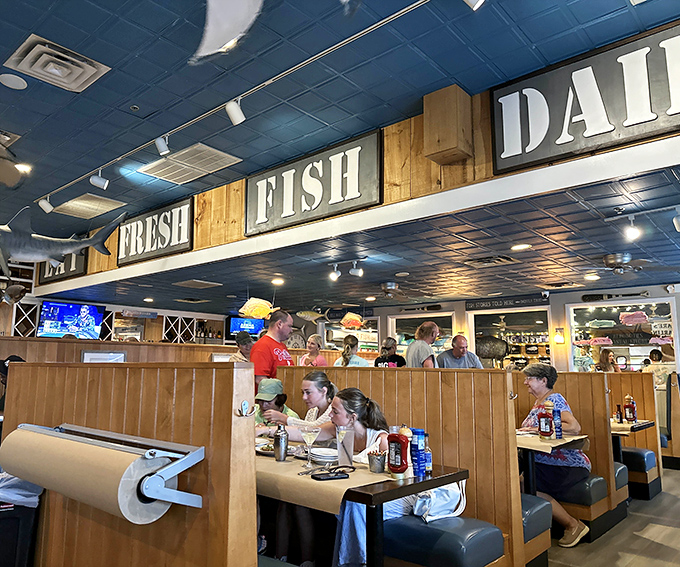 Inside, warm wood tones and nautical touches create the perfect atmosphere for serious seafood without stuffy pretensions.