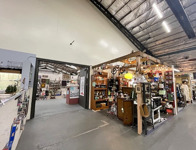 Step inside and the treasure hunt begins – vendor booths stretch as far as the eye can see, each one a portal to a different era of American life.