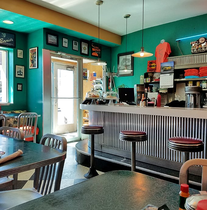 Step inside and the vibrant turquoise walls, corrugated metal counter, and red vinyl stools create the diner trifecta of nostalgic perfection.