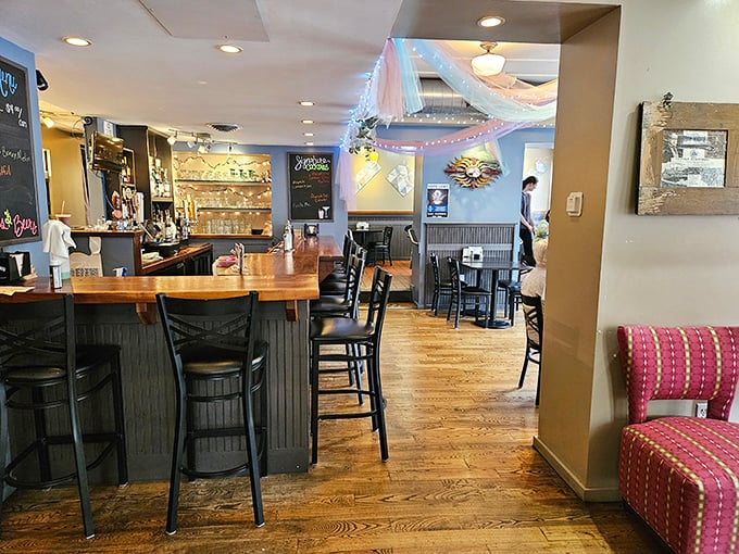 Where warm wood meets cool conversation. This isn't just a bar—it's Bellefonte's living room, complete with that one quirky chair nobody sits in.