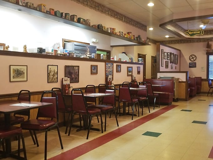Classic Americana lives in these burgundy vinyl booths and checkerboard floors—a dining room where conversations matter more than Instagram likes.