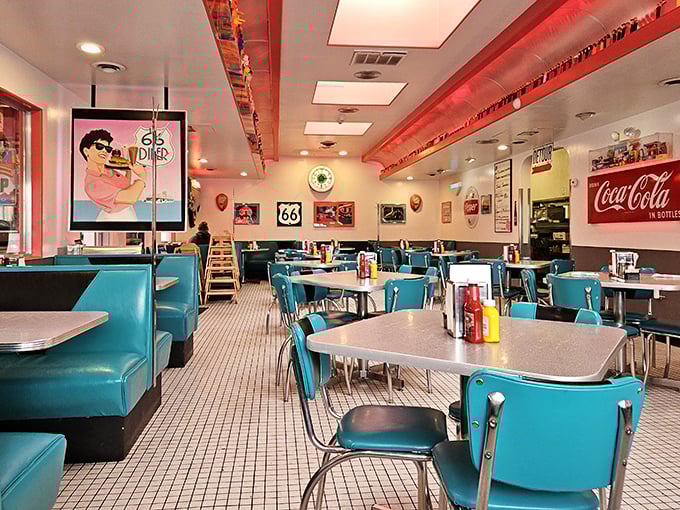 Step inside and the 1950s never ended—turquoise booths, checkered floors, and enough neon to guide a plane home on a foggy night.