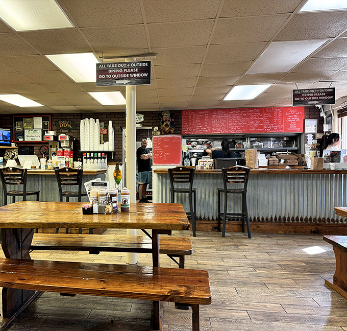 No-frills interior where the focus is exactly where it should be: on that glorious menu board and the smoky treasures waiting behind the counter.