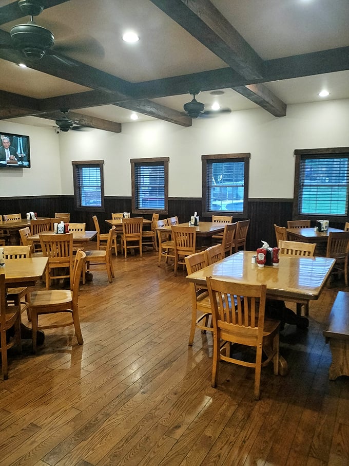 Wooden beams, warm lighting, and tables spaced just right—this dining room knows the secret formula for turning strangers into regulars. 