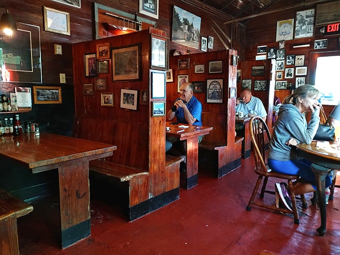 Wooden booths worn smooth by decades of happy diners create the perfect nooks for savoring both conversation and cuisine at this Key West institution.