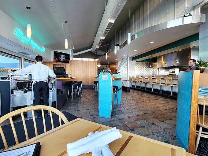 Inside, the nautical-meets-Northwest vibe creates the perfect backdrop for seafood indulgence. Those pendant lights aren't just illuminating tables—they're spotlighting culinary magic.