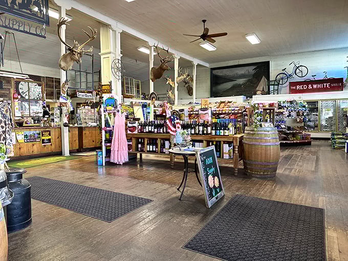 Step inside and you're greeted by mounted deer heads, wooden barrels, and enough authentic country store charm to make Cracker Barrel look like an airport gift shop.