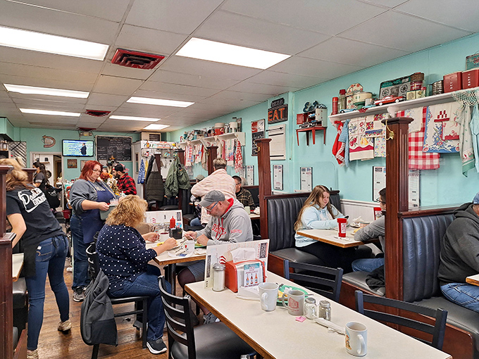 Inside, nostalgia isn't just served—it's the main course. The turquoise walls and vintage decor create the perfect backdrop for breakfast magic.