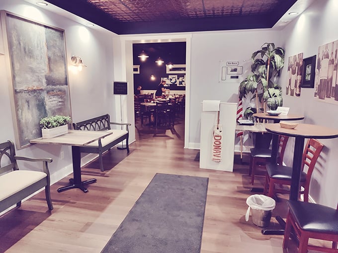 Step into a waiting area that feels like the calm before the delicious storm—elegant, inviting, and mercifully free of the kitschy nets and buoys.