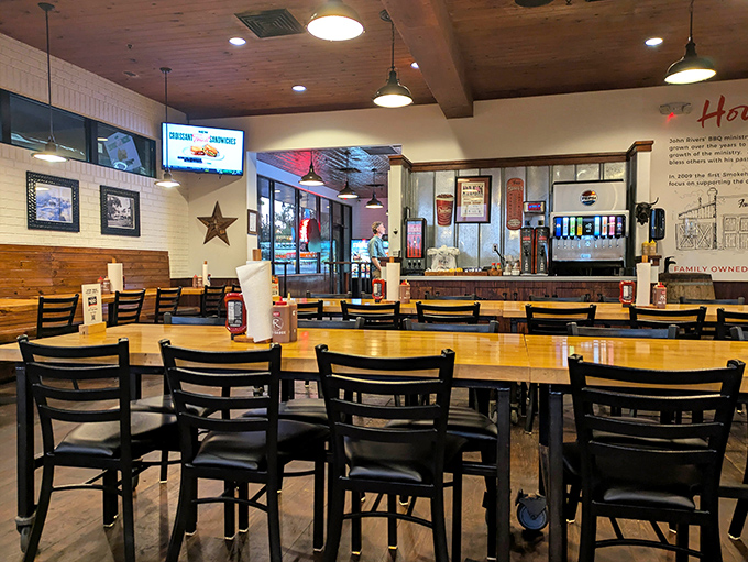 Where barbecue dreams come true – wooden tables, industrial lighting, and the promise of meat that's been pampered longer than most spa treatments.