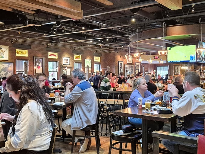 Inside, the exposed brick and wooden beams create that perfect "third place" vibe—not home, not work, but somewhere you'd happily spend hours with friends and strangers alike.