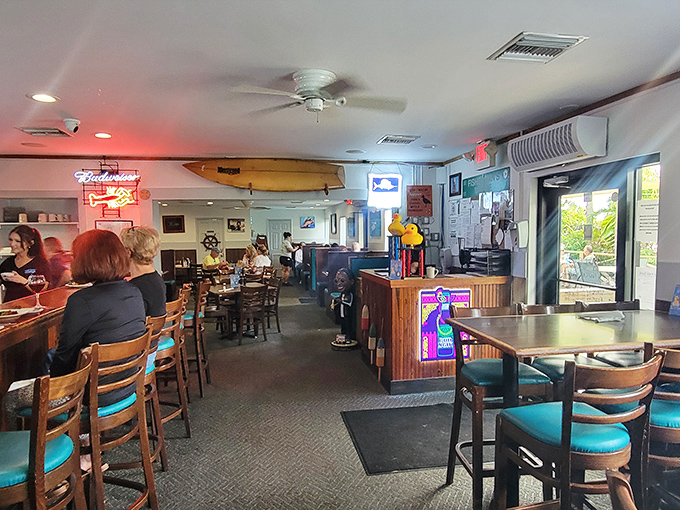 Inside, surfboards hang from the ceiling while nautical charm fills every corner – it's Florida dining without pretension.