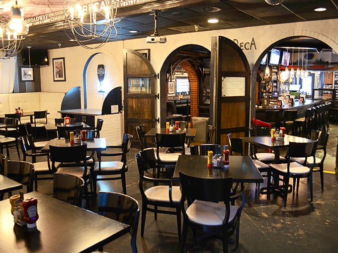 Step inside and you're transported to New York—brick archways, moody lighting, and tables ready for serious sandwich business.