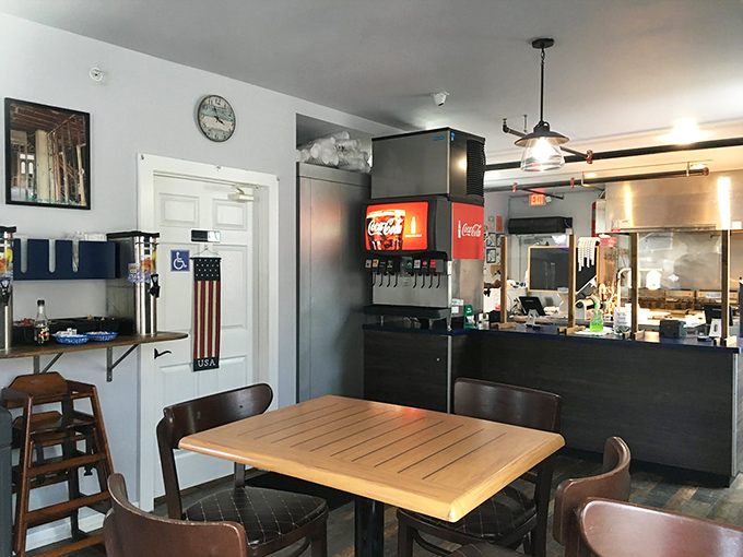 Simple wooden tables, classic soda fountain, and no-nonsense counter service—this isn't dining theater, it's the real Florida food experience where flavor takes center stage.