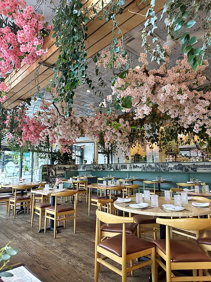 Dining under a canopy of pink blossoms isn't just romantic—it's Tuesday at AMBAR. This floral wonderland makes every meal feel like a special occasion.