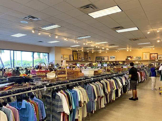 Rows upon rows of meticulously organized clothing stretch toward the horizon—like a rainbow of second chances waiting to be discovered.