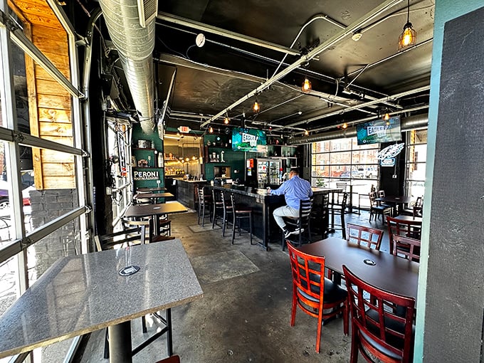 Industrial-chic meets neighborhood comfort inside Jaxx, where exposed ductwork and pendant lighting create the perfect backdrop for serious eating.