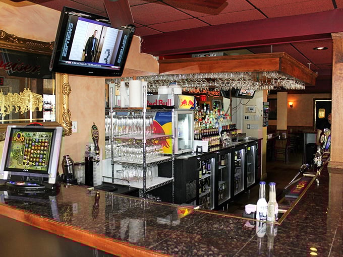 Where glasses hang like crystal stalactites and conversations flow as smoothly as the drinks. This bar has witnessed more Pennsylvania stories than a historical society.