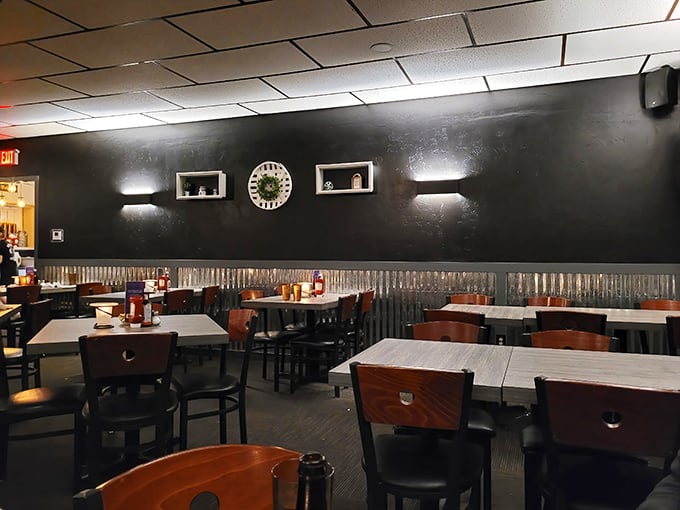 Dark walls, corrugated metal wainscoting, and wooden tables create that unmistakable Wisconsin supper club ambiance—where time slows down and calories don't count.