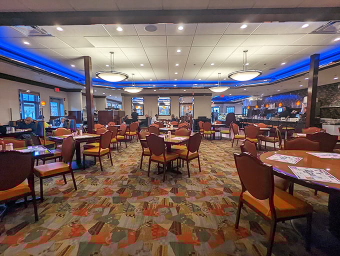 The spacious interior, with its distinctive blue accent lighting and patterned carpet, offers the perfect backdrop for life's most important decisions: pancakes or waffles?