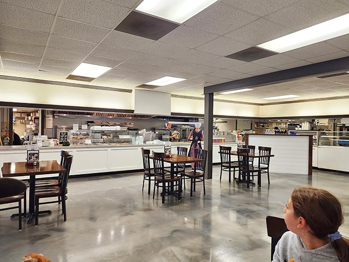 Simple tables, fluorescent lighting, and zero pretension – this dining room puts all its energy where it matters most: the food that's about to rock your world.