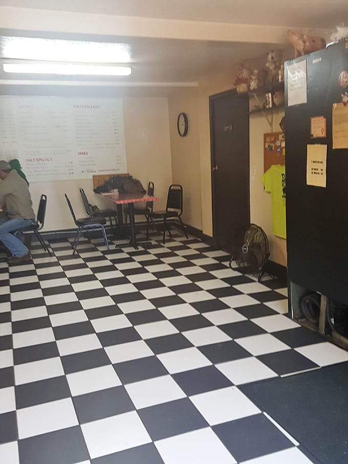 Classic black and white checkered floors set the stage for barbecue greatness. No frills, just thrills for your taste buds.