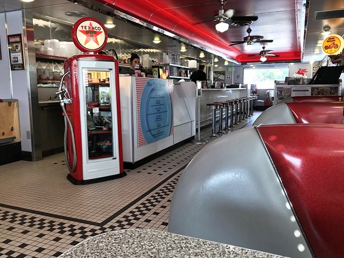 Step inside and time-travel to the 1950s, complete with a vintage Texaco pump. This isn't just a meal—it's a full-fledged nostalgia expedition.