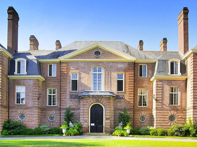 The French Provincial-style Kingwood Hall commands attention with its symmetrical design, circular windows, and stately presence—architectural eye candy at its finest.