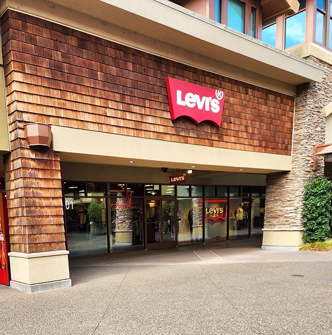 Levi's iconic red tab beckons from its rustic wooden façade. Where denim dreams come true without emptying your wallet.