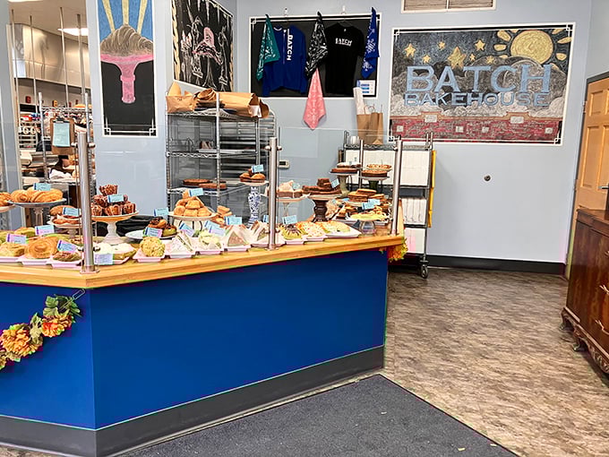 Blue counters showcase edible treasures like museum exhibits, except here you're encouraged to touch—and devour—the artwork.