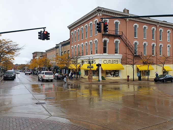 Rain-slicked streets make Cutler's yellow awning pop like a beacon of retail therapy against Petoskey's classic brick architecture.