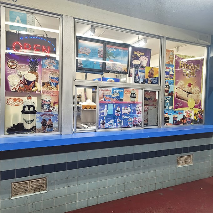 That glowing "OPEN" sign might as well say "Happiness Served Here." The ordering window promises dairy dreams come true.