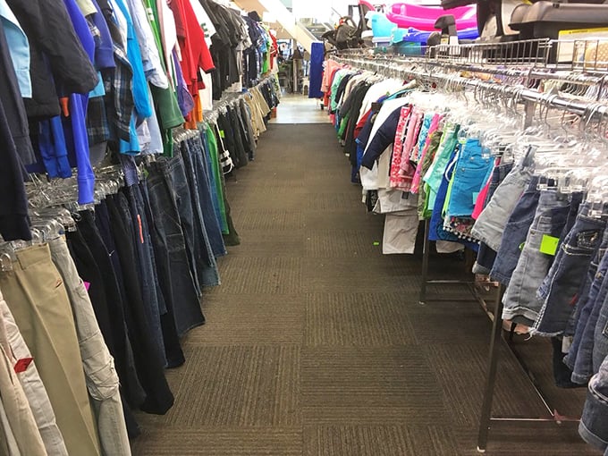 Fashion treasure hunters, prepare for sensory overload. These meticulously organized racks stretch toward the horizon like a rainbow highway of second chances.