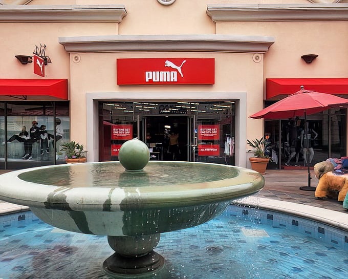 Water features and Spanish-inspired design elevate Puma from just another sneaker stop to a retail oasis. That fountain isn't just pretty—it's where shopping decisions are contemplated.