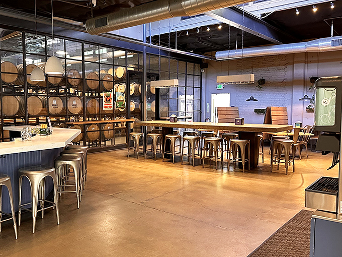 Industrial-chic meets barrel-aged ambiance – where wood, metal, and the promise of craft beer create the perfect backdrop for meat meditation.