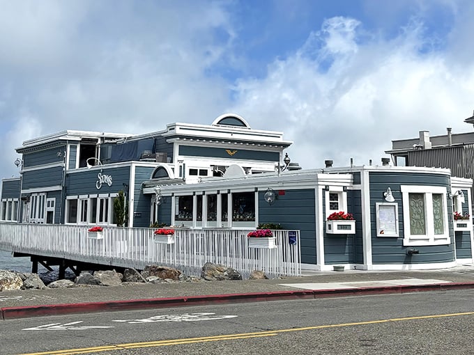 Scoma's of Sausalito stands sentinel at the water's edge, its blue-gray façade and white trim as classic as the seafood dishes served within.