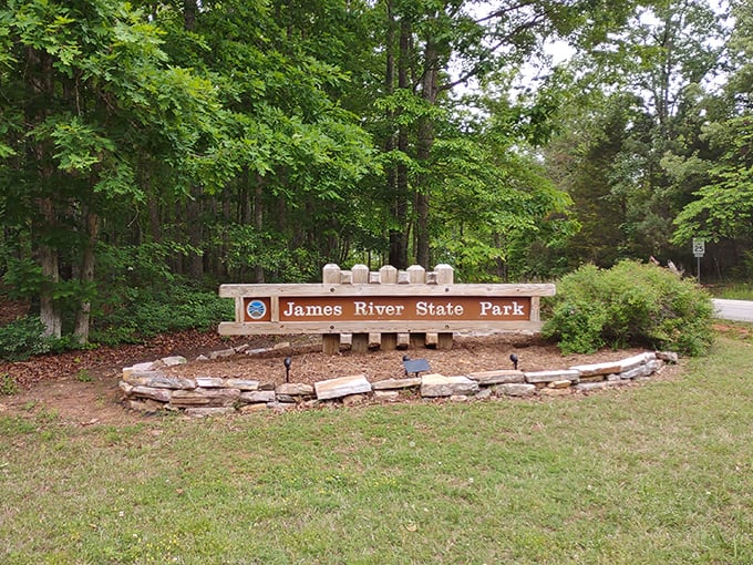 The entrance sign doesn't just say "welcome" – it whispers "slow down, city slicker, the squirrels have right of way here."