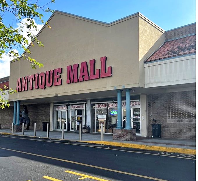 Those red columns aren't just architectural flair—they're like beacons guiding bargain hunters to a wonderland of yesteryear's finest offerings.
