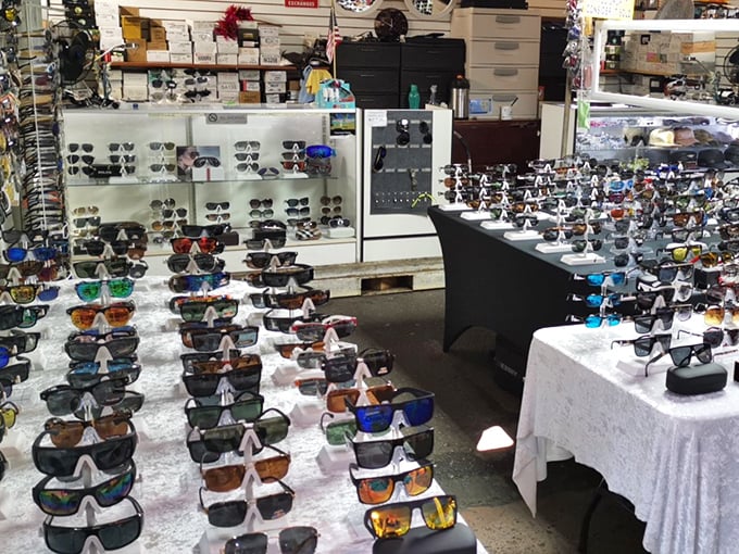 An ocean of sunglasses stretches to the horizon. Like picking a favorite child, impossible to choose just one pair when they're practically giving them away.