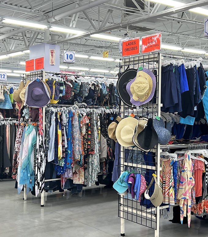 The women's section is a kaleidoscope of fashion history. Those sun hats aren't just accessories—they're time machines to summers past.