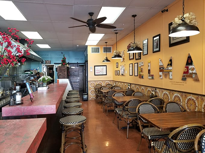 Yellow walls adorned with memories and bistro chairs that have supported countless happy diners. Comfort lives here.